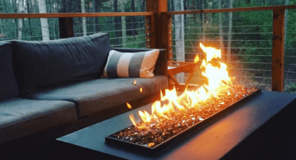 10 Pool Fire Pit and Fireplace Designs Your Guests Will Envy